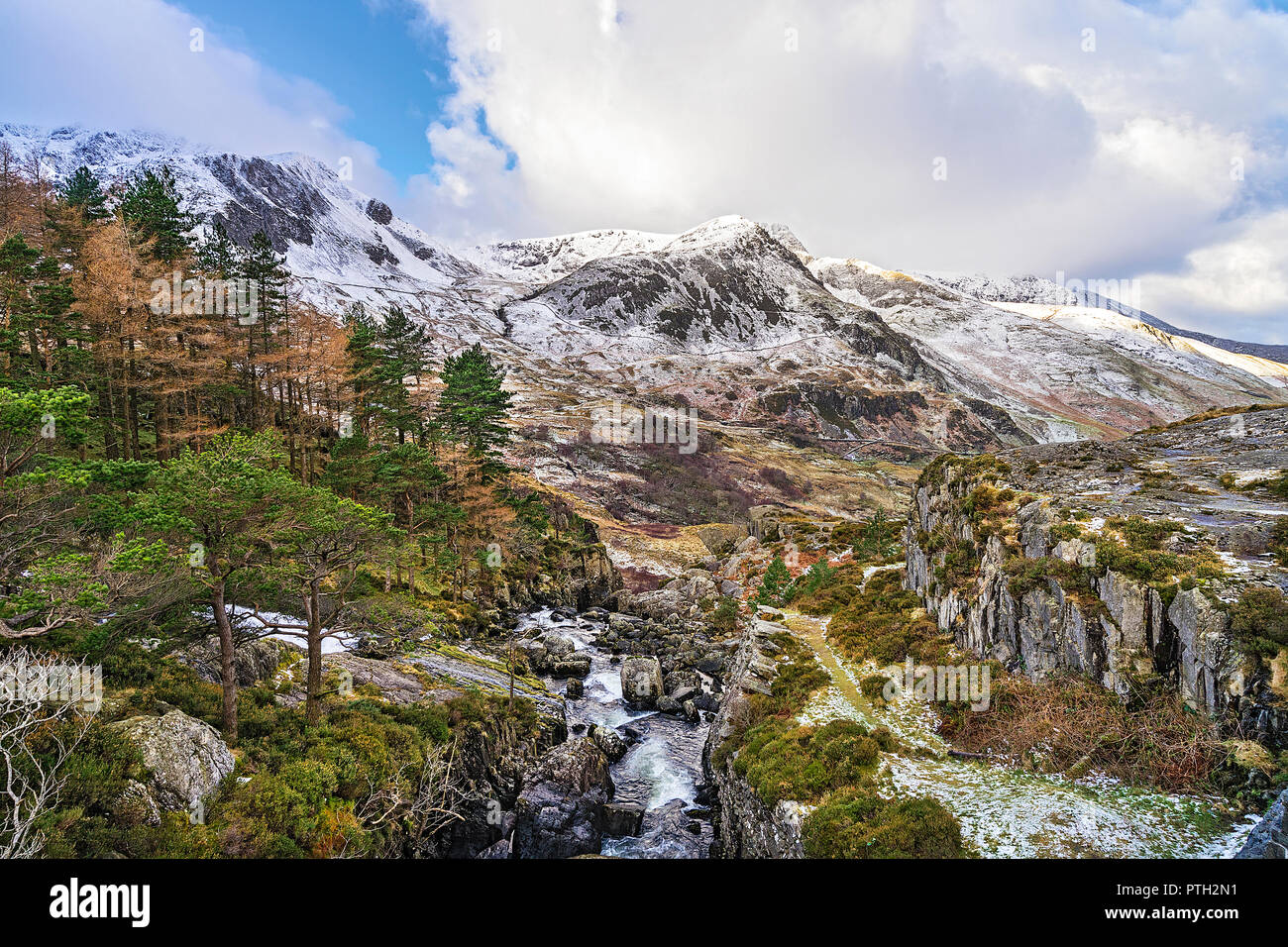 View down Ogwen Falls from the bridge over the A5 road with the Nant ...