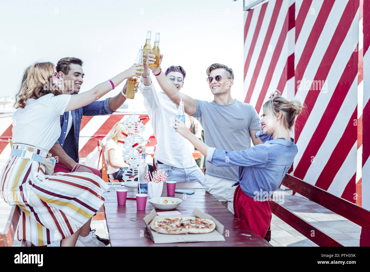 Positive delighted colleagues celebrating end of project Stock Photo ...