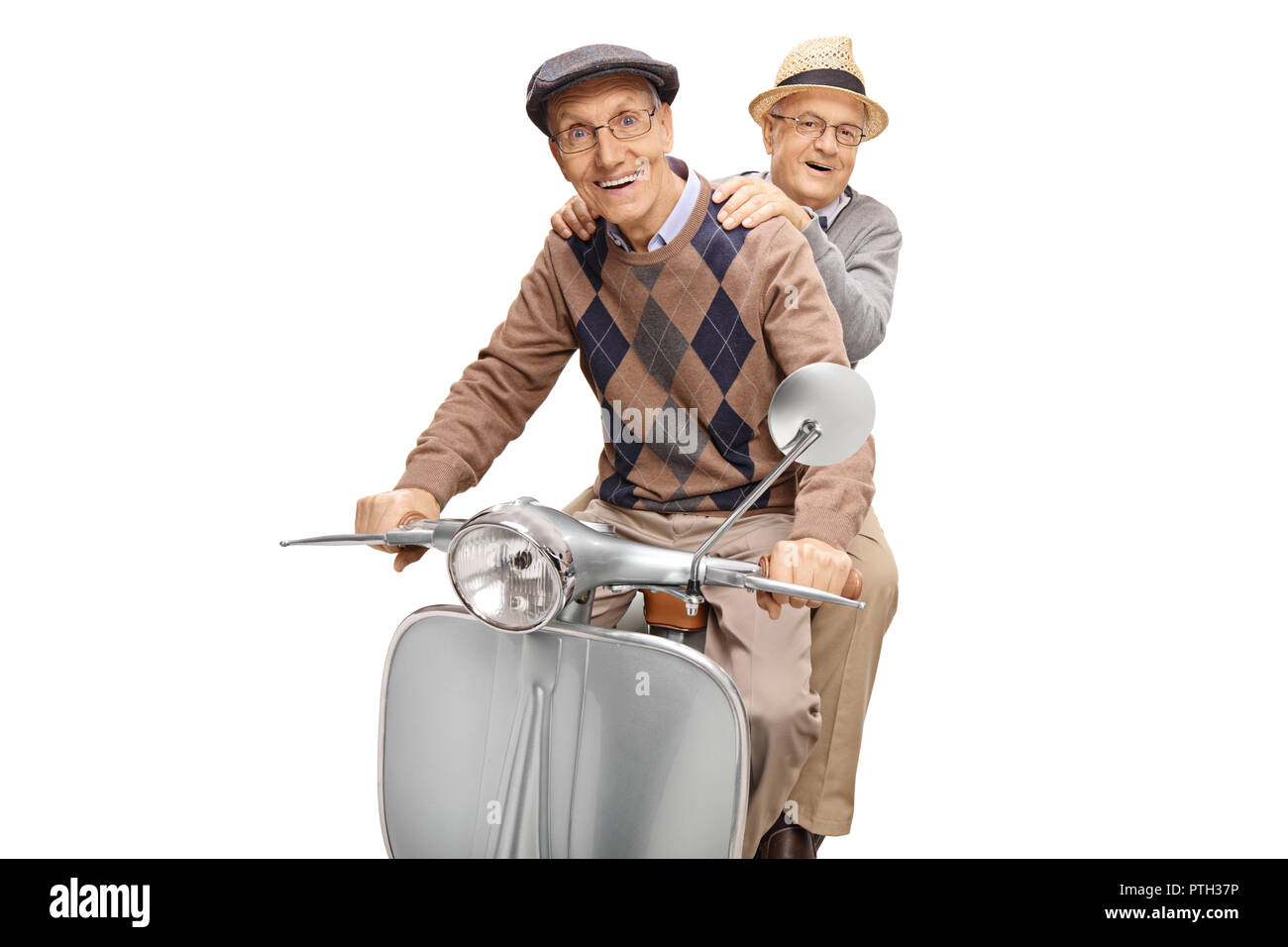 Two senior men riding on a scooter isolated on white background Stock ...