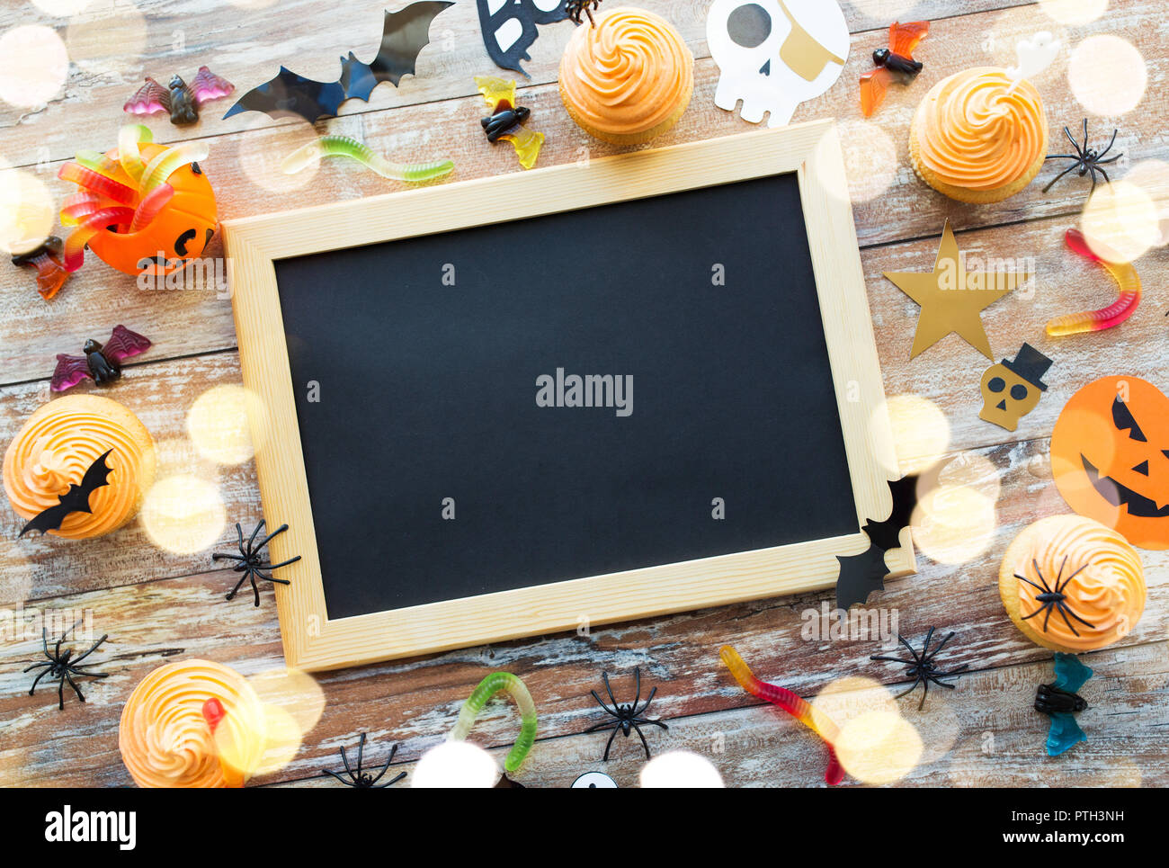 blank chalkboard and halloween party decorations Stock Photo - Alamy