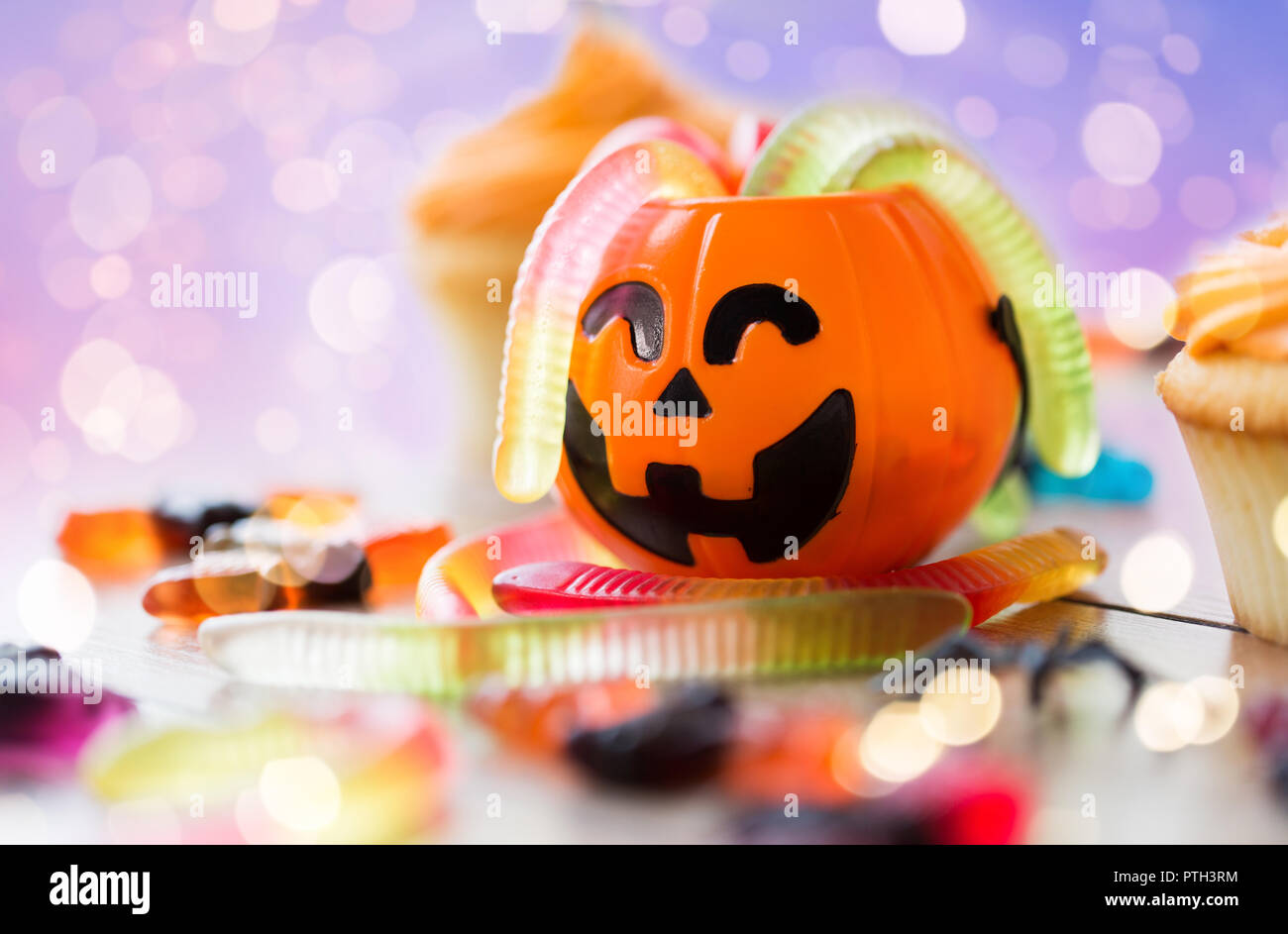 gummy worms and candies for halloween party Stock Photo - Alamy
