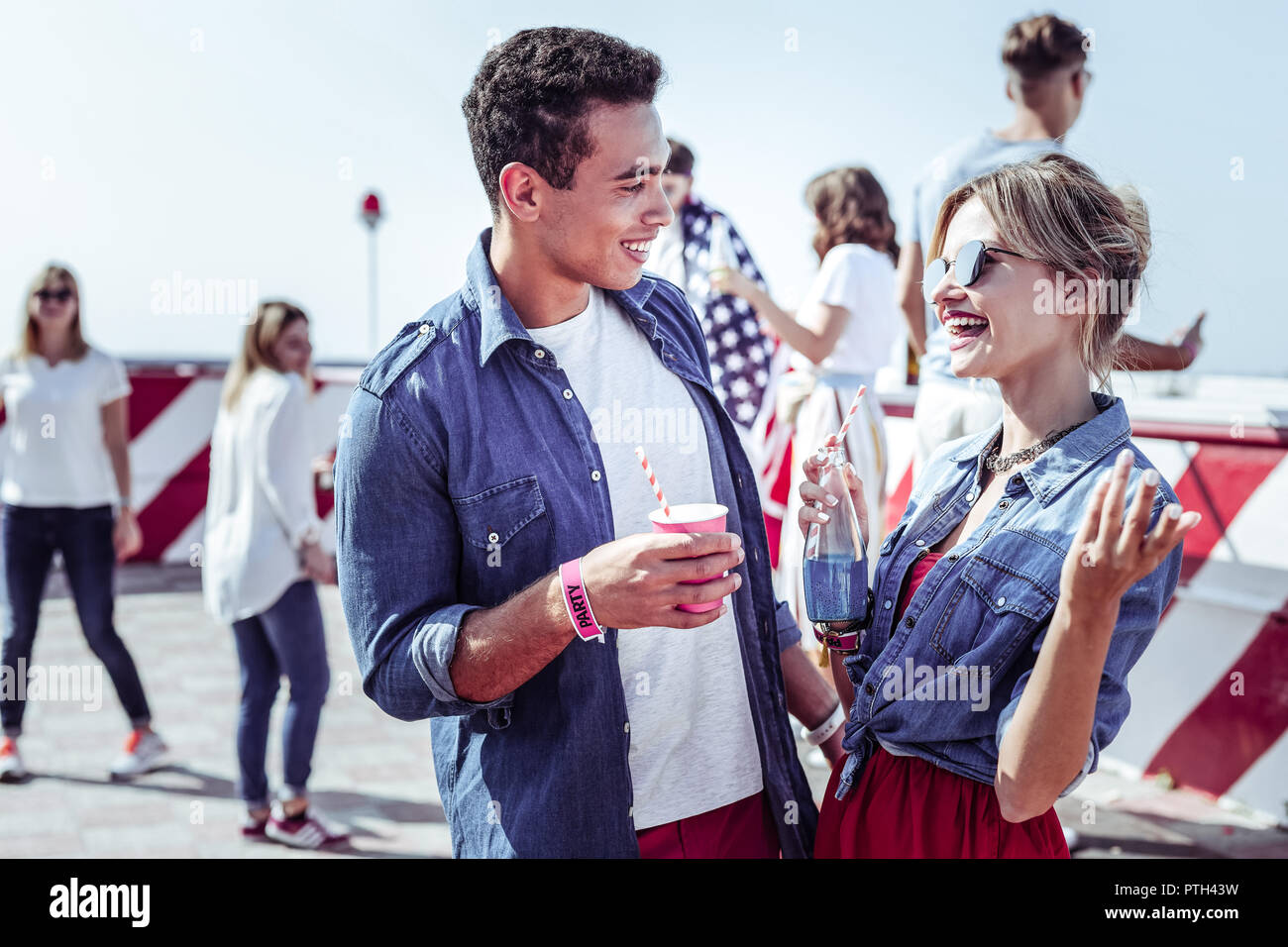 Happy young female person visiting students party Stock Photo - Alamy