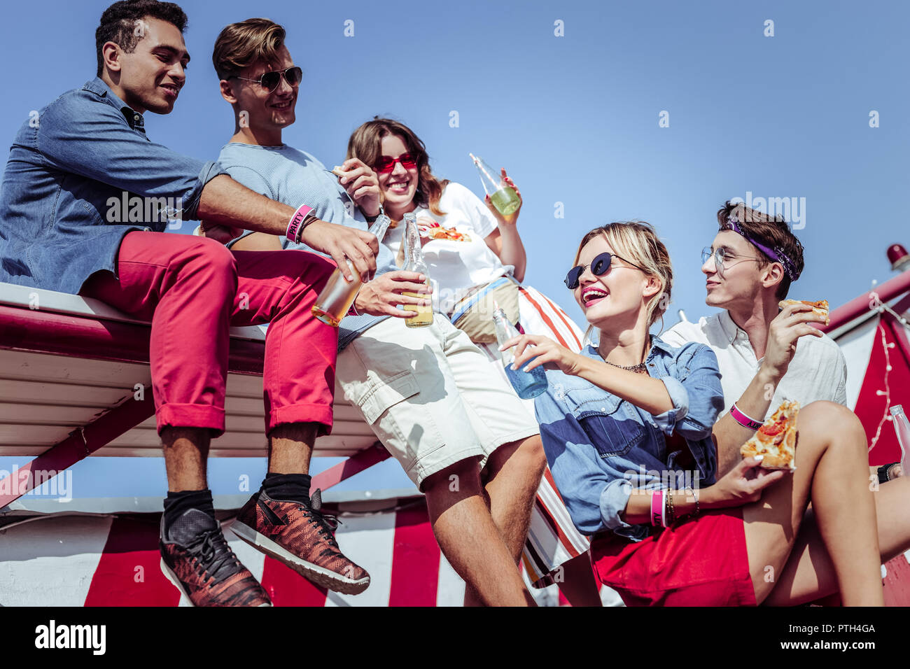 Happy students celebrating end of final exams Stock Photo - Alamy