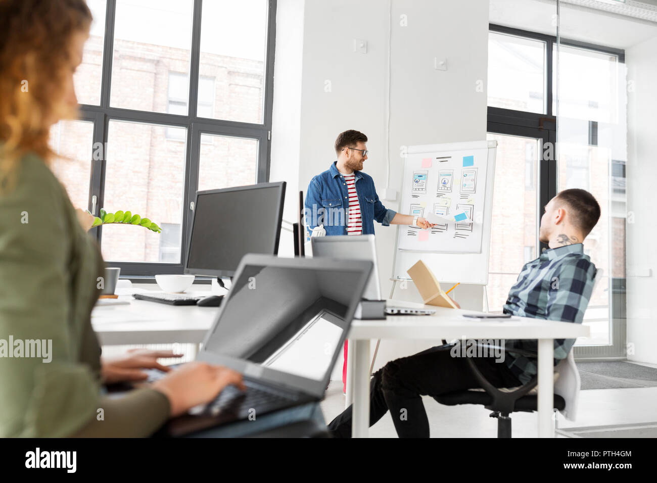 creative man showing user interface at office Stock Photo - Alamy