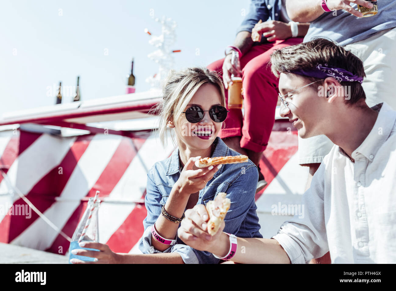 Amazing female person going to feed her friend Stock Photo - Alamy