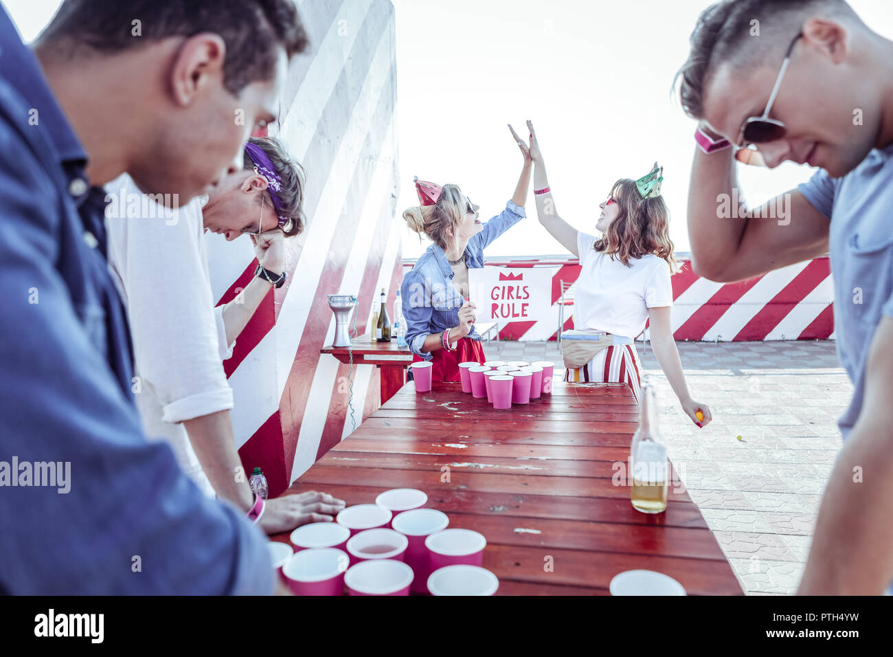 Happy females celebrating their win in game Stock Photo - Alamy
