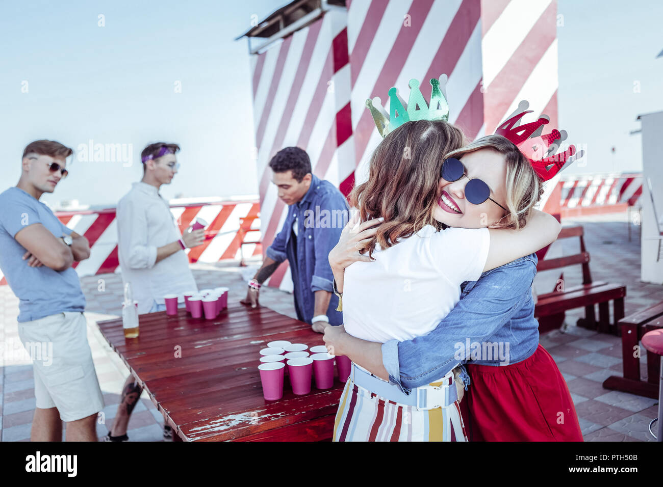 Happy girls expressing their real emotions on camera Stock Photo - Alamy