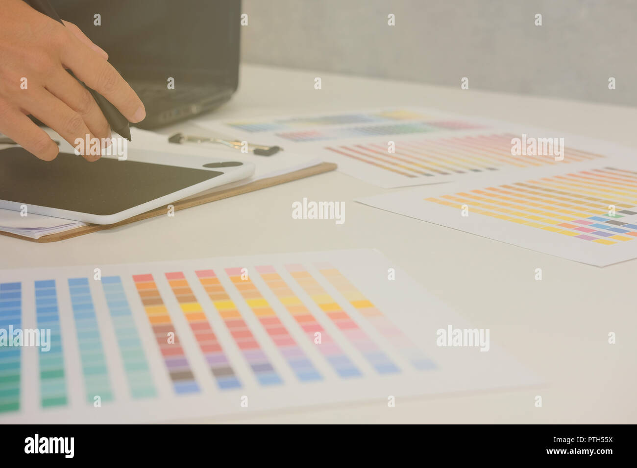 interior designer artist working on graphic tablet at office ...