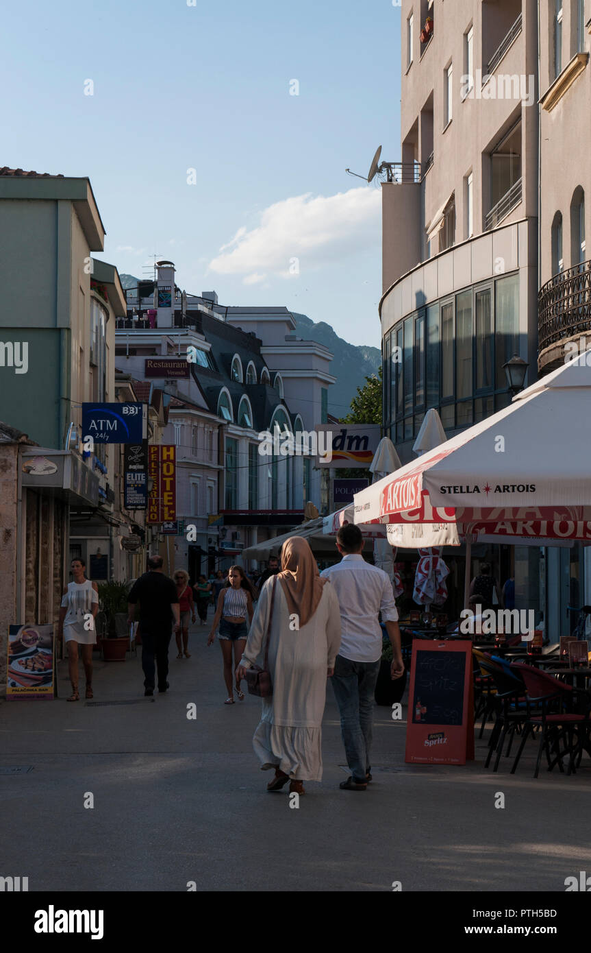 Bosnia and Herzegovina, Europe: a veiled muslim woman walking with his ...