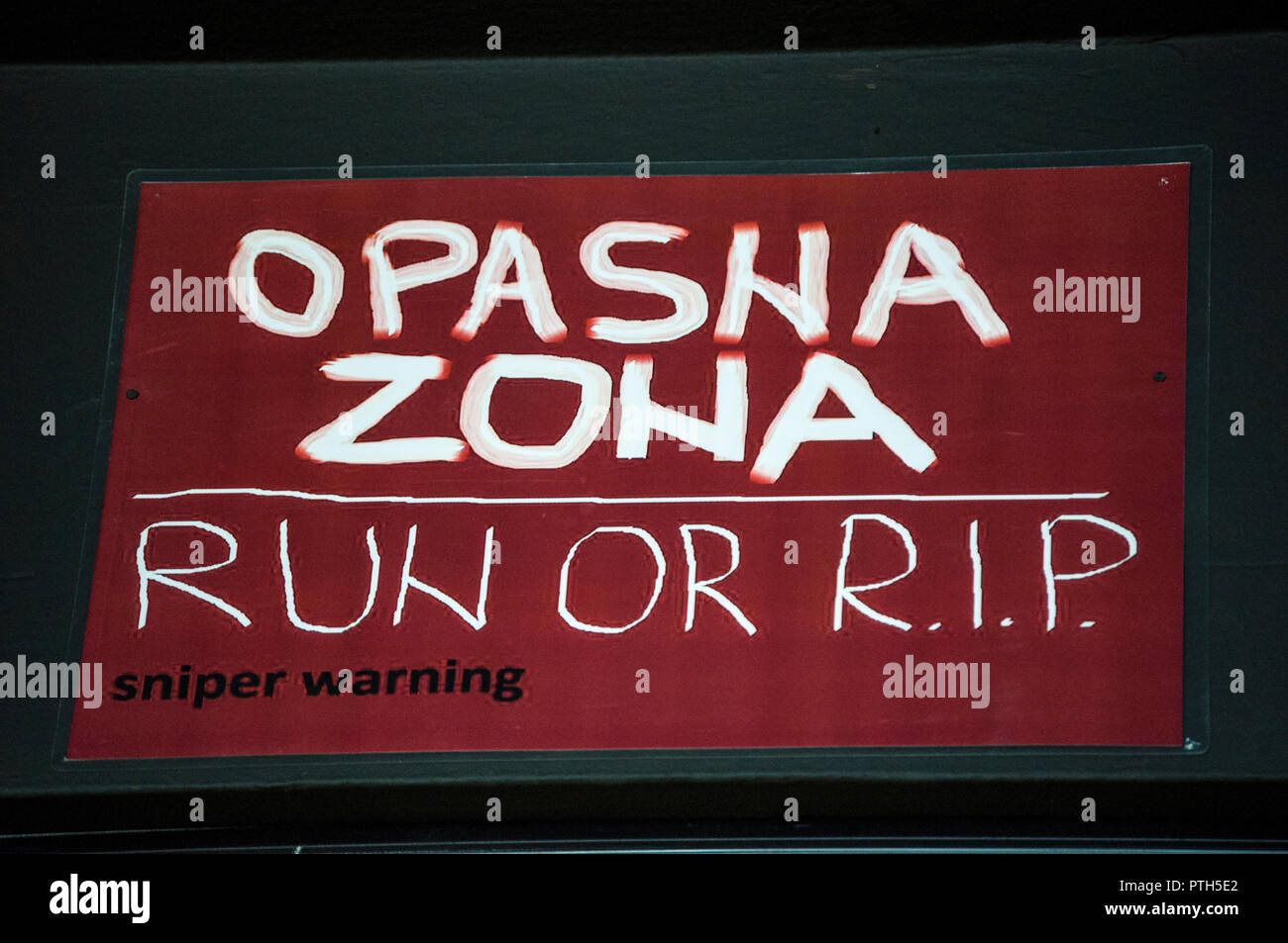 Mostar, Bosnia, Europe: the red sign Run or Rip, a sniper warning, in ...