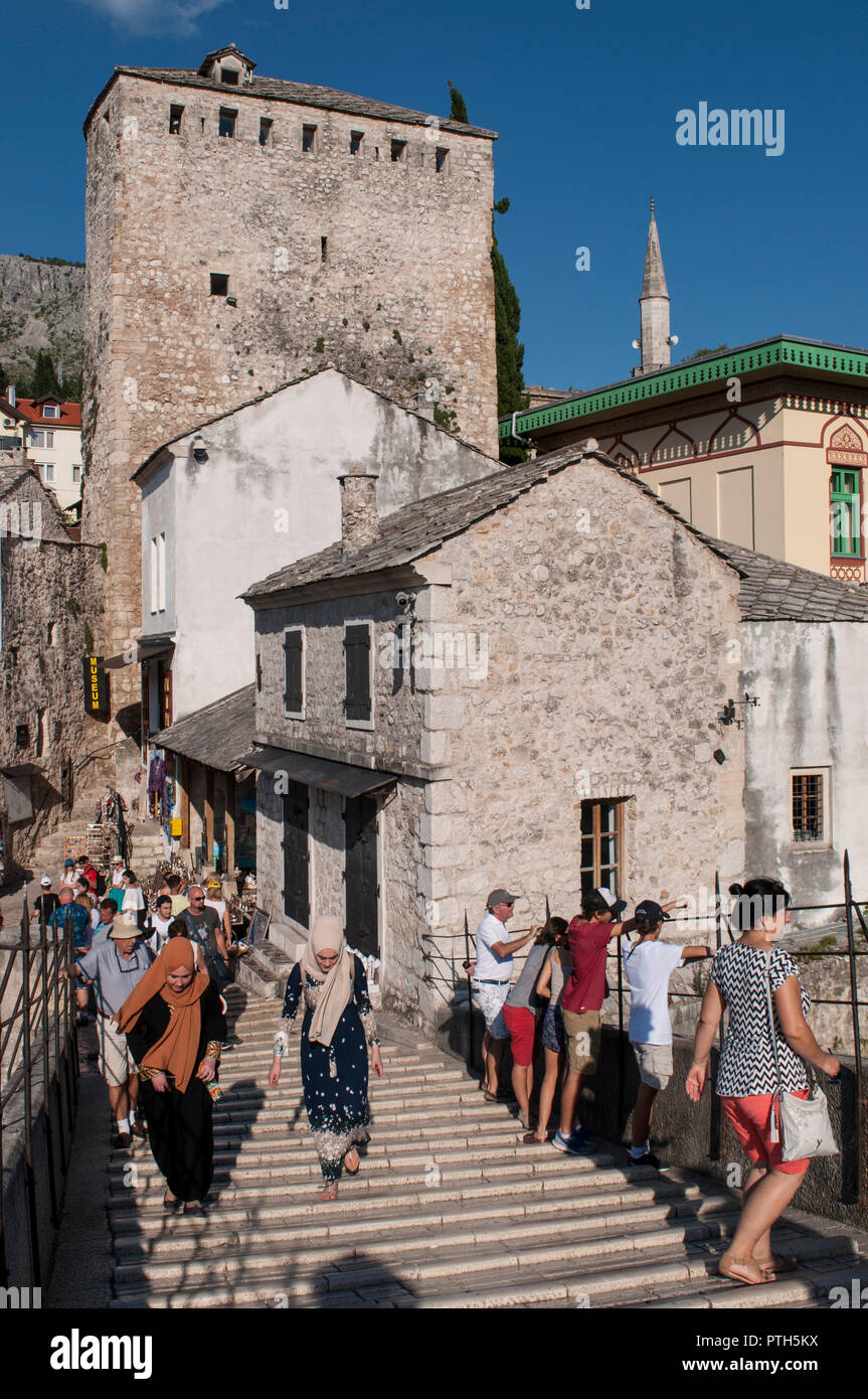 Mostar: people on the Stari Most, the 16th century Ottoman bridge ...