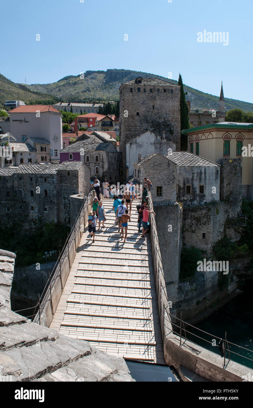 Mostar: people on the Stari Most, the 16th century Ottoman bridge ...