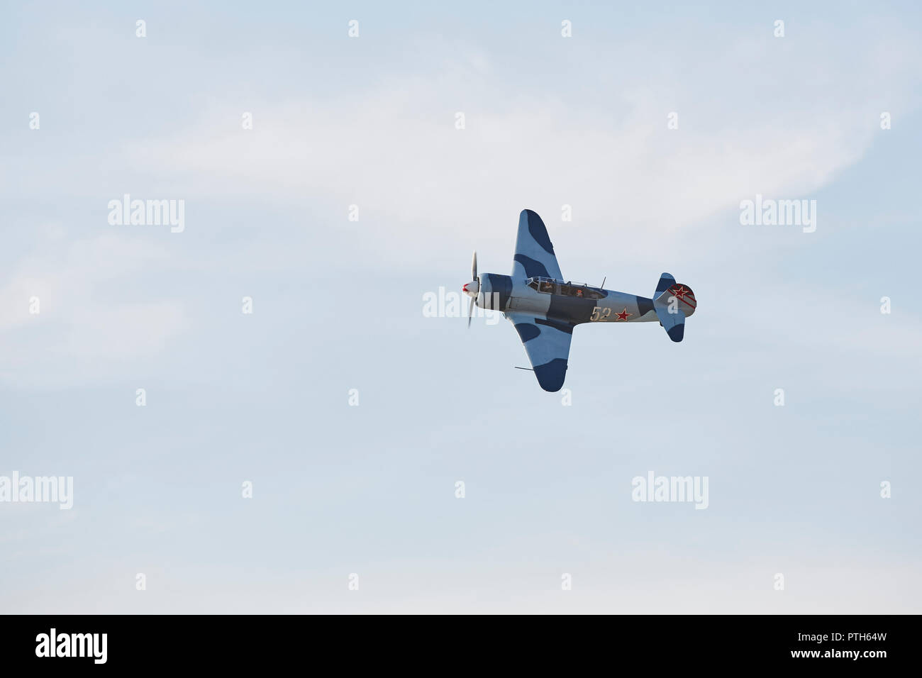 Vintage plane flying overhead Stock Photo - Alamy