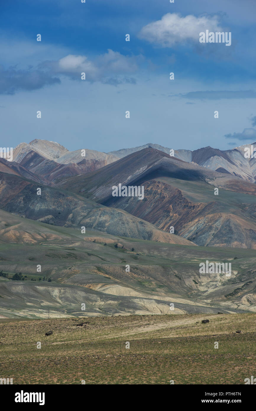 Different colored mountains Stock Photo - Alamy