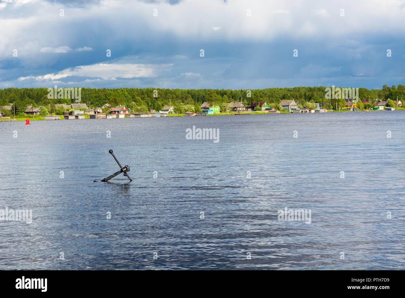 Nature - river with anchor and village on shore, summer time Stock ...