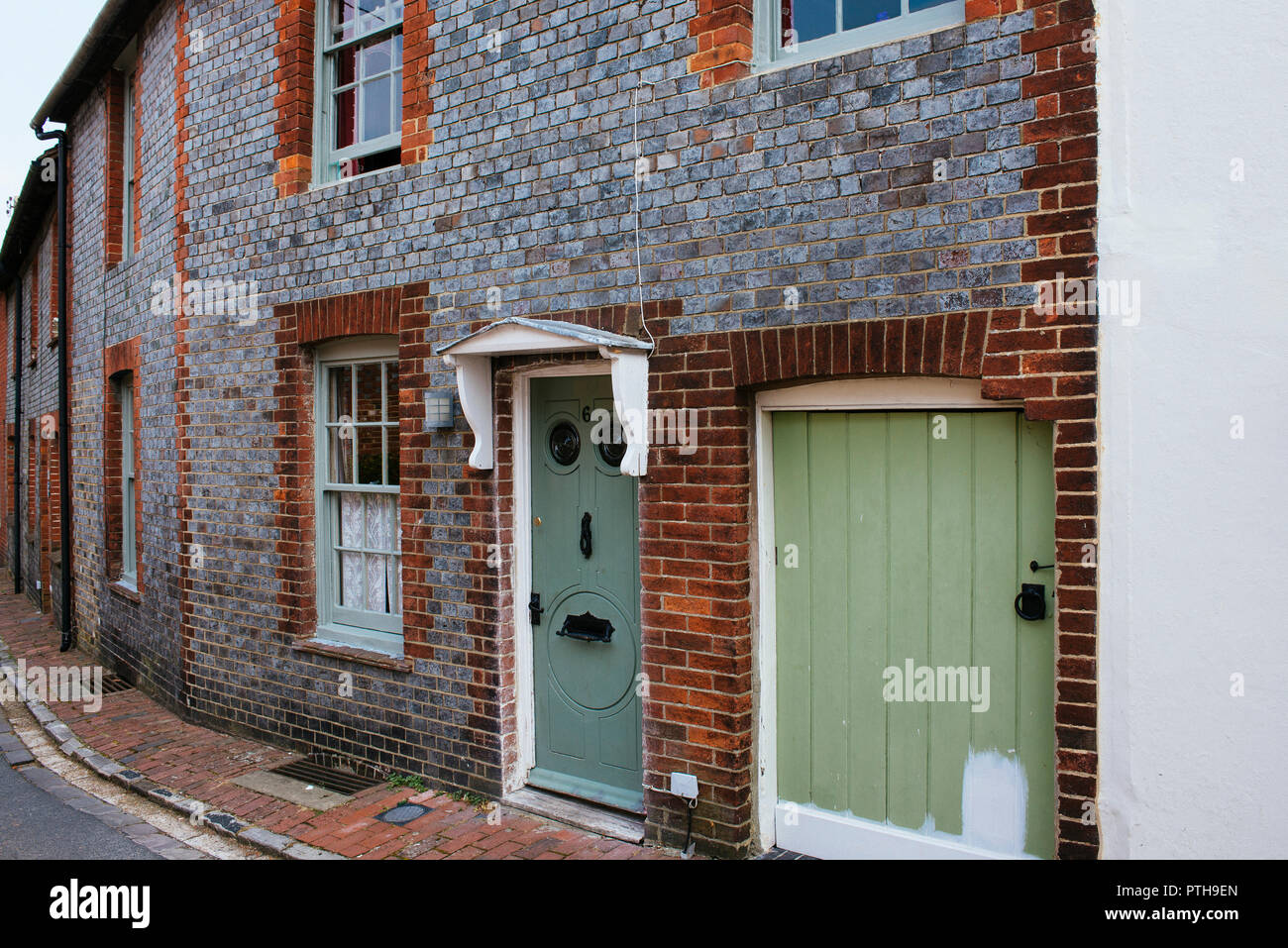 Typical flint cottage hi-res stock photography and images - Alamy