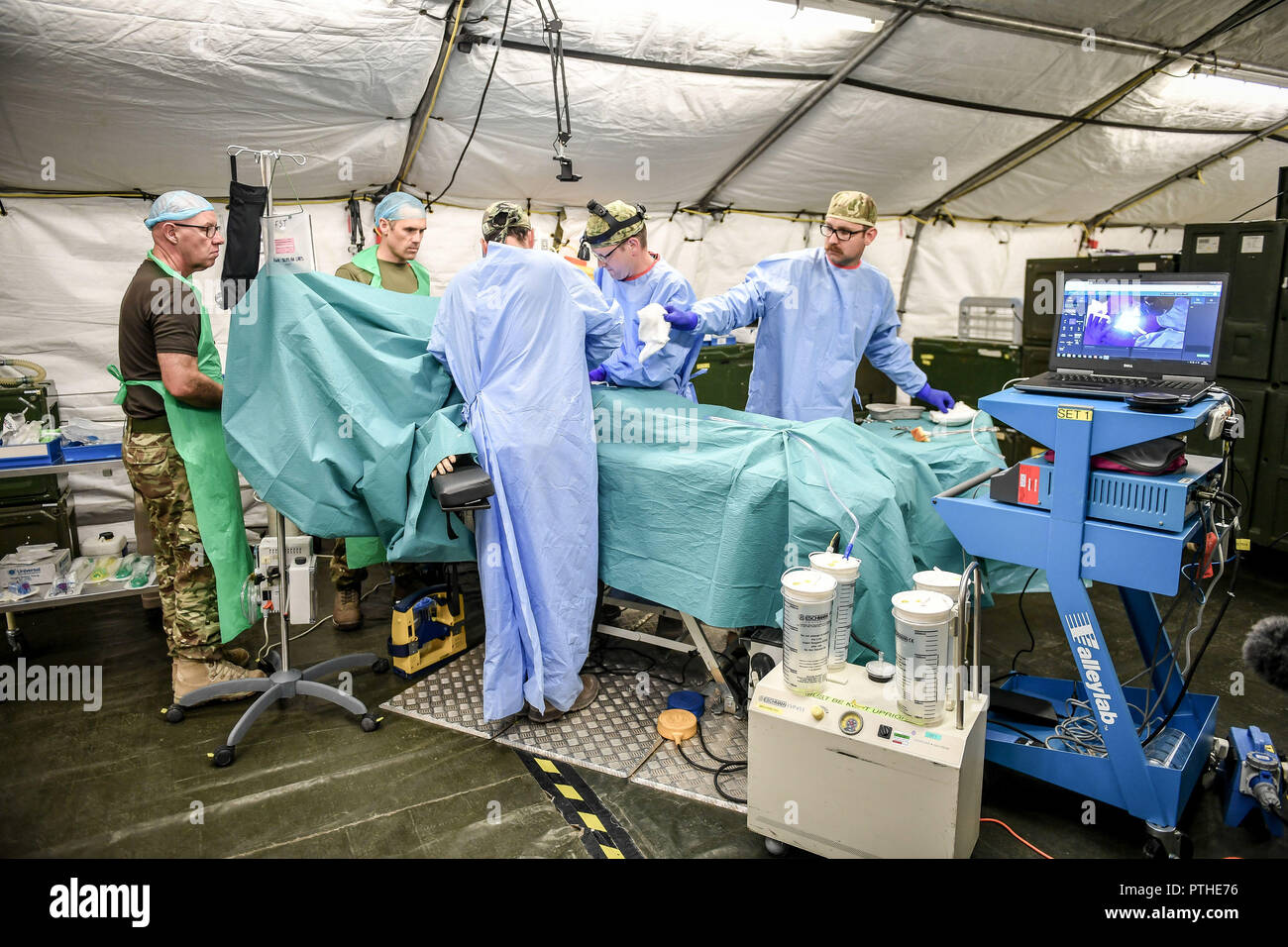 Soldiers at 22 field hospital attend to a simulated casualty in the ...