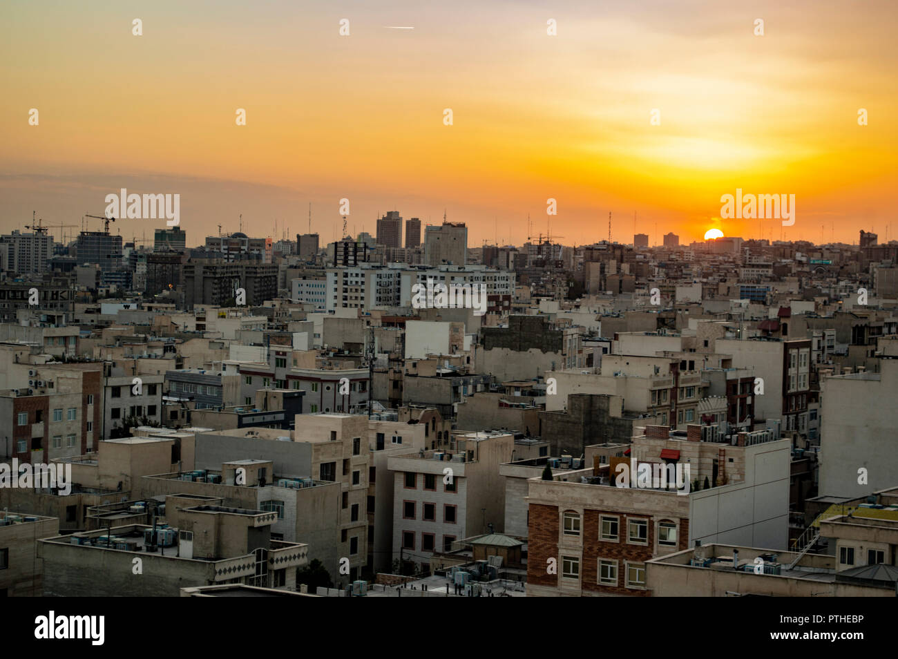The sun setting in Tehran, Iran Stock Photo - Alamy
