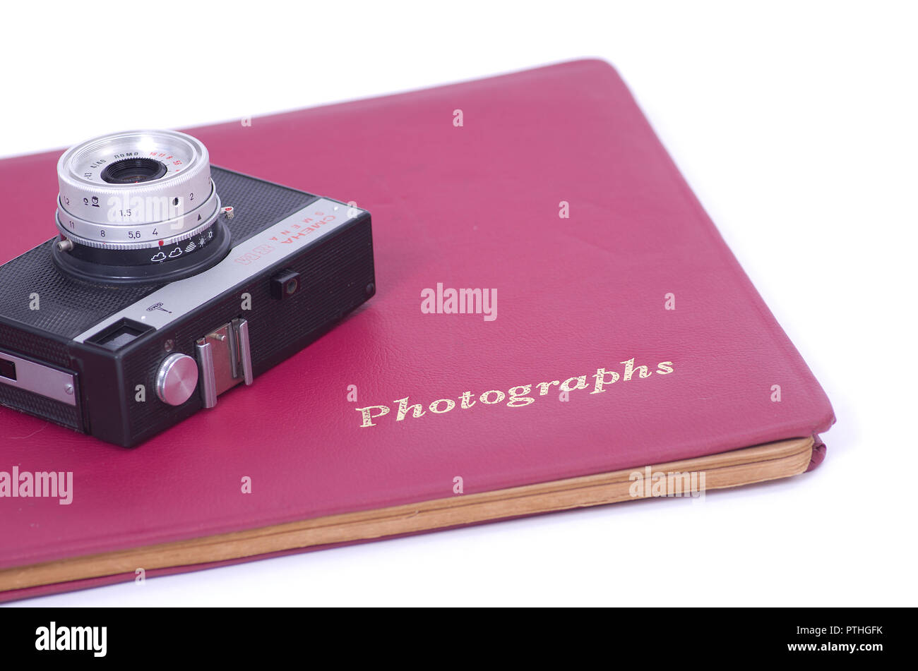 Camera Smiena 8m and photo album on a white background Stock Photo - Alamy