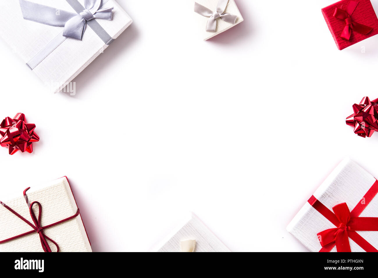 White and red gift boxes isolated on white background. Top view ...