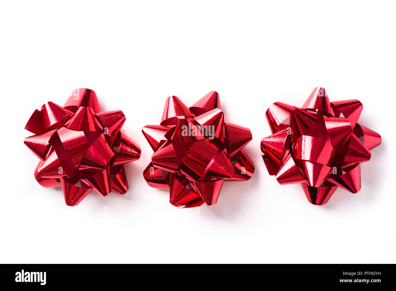 Red ribbon gift box isolated on white background. Top view Stock Photo ...