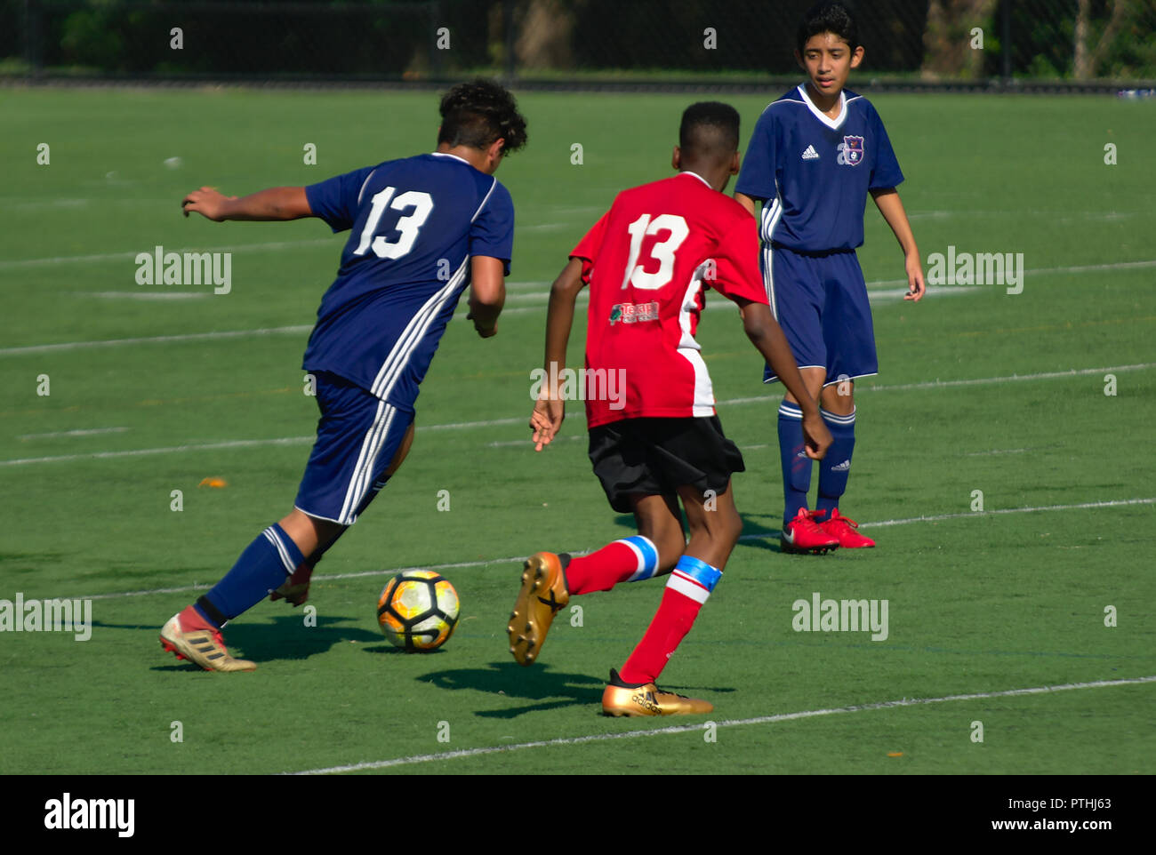 Soccer kick african school game hi-res stock photography and images - Alamy