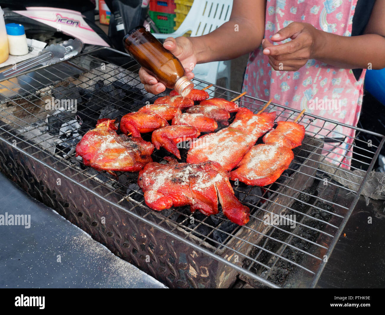 PATTAYA, THAILAND - MAY 25, 2018: Grilled chicken with stick on bbq ...