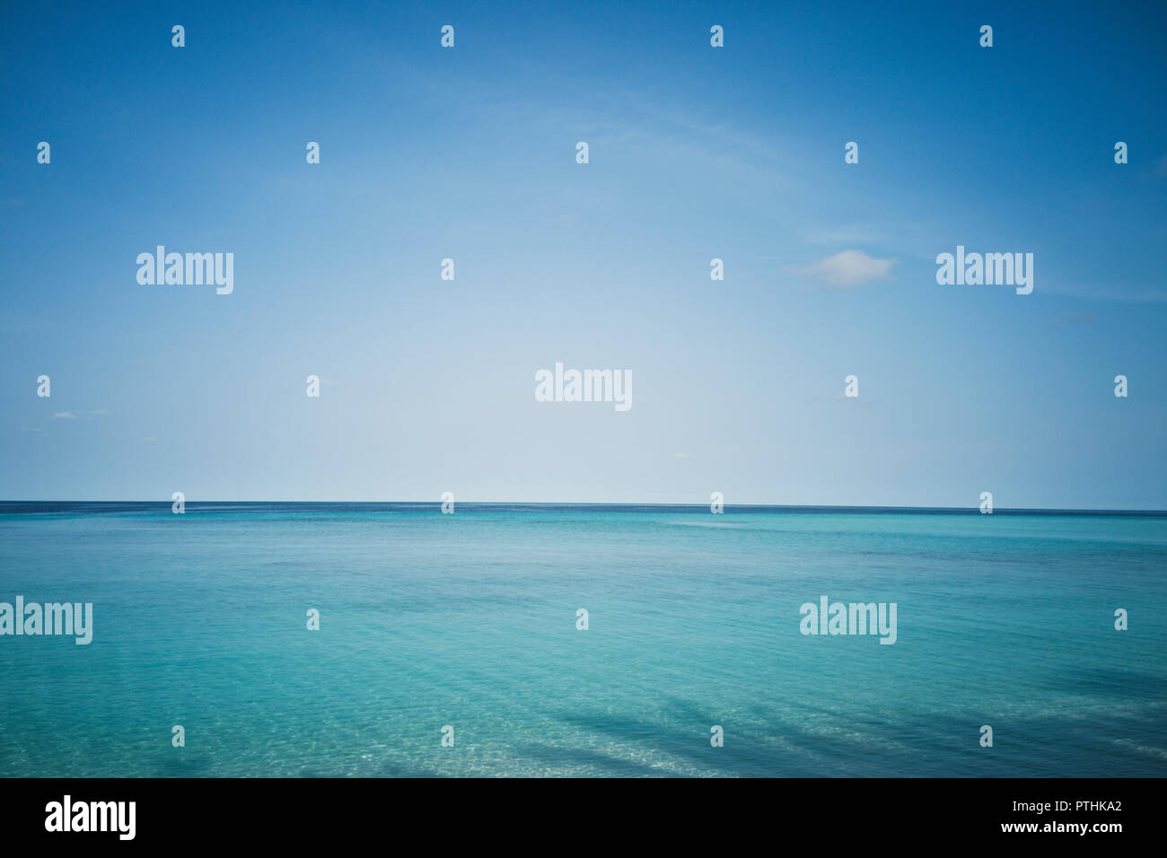 Idyllic, tranquil blue seascape under blue sky, Maldives, Indian Ocean ...