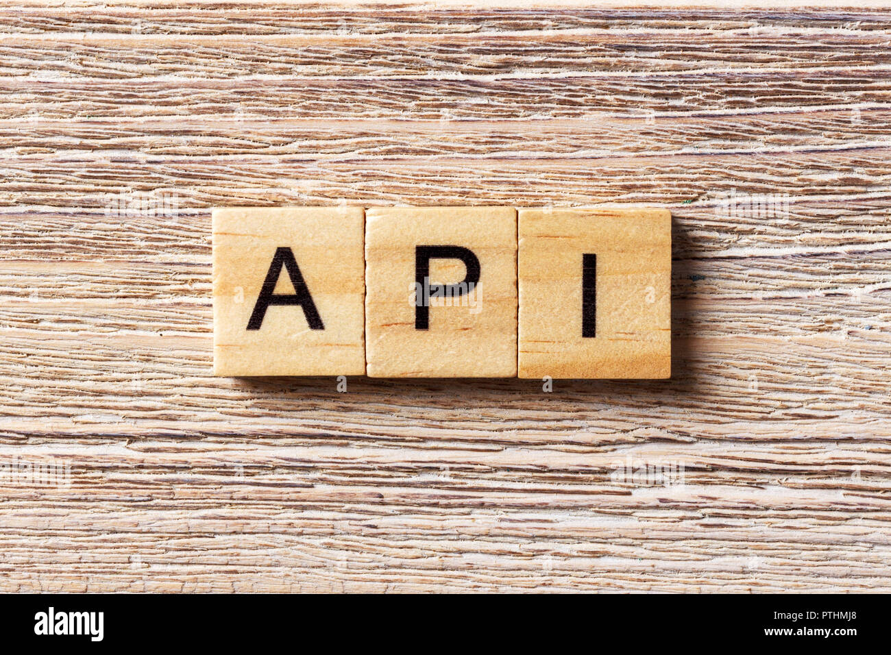 API word written on wood block. application program interface text on ...