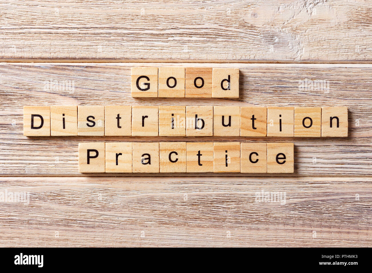 good distribution practice word written on wood block. good ...