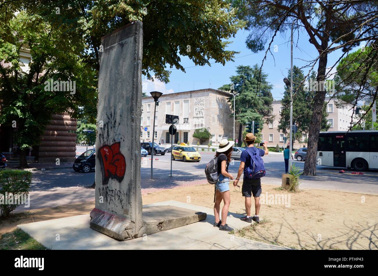 PostBlloku Checkpoint Monument tirana albania; a young tourist couple ...