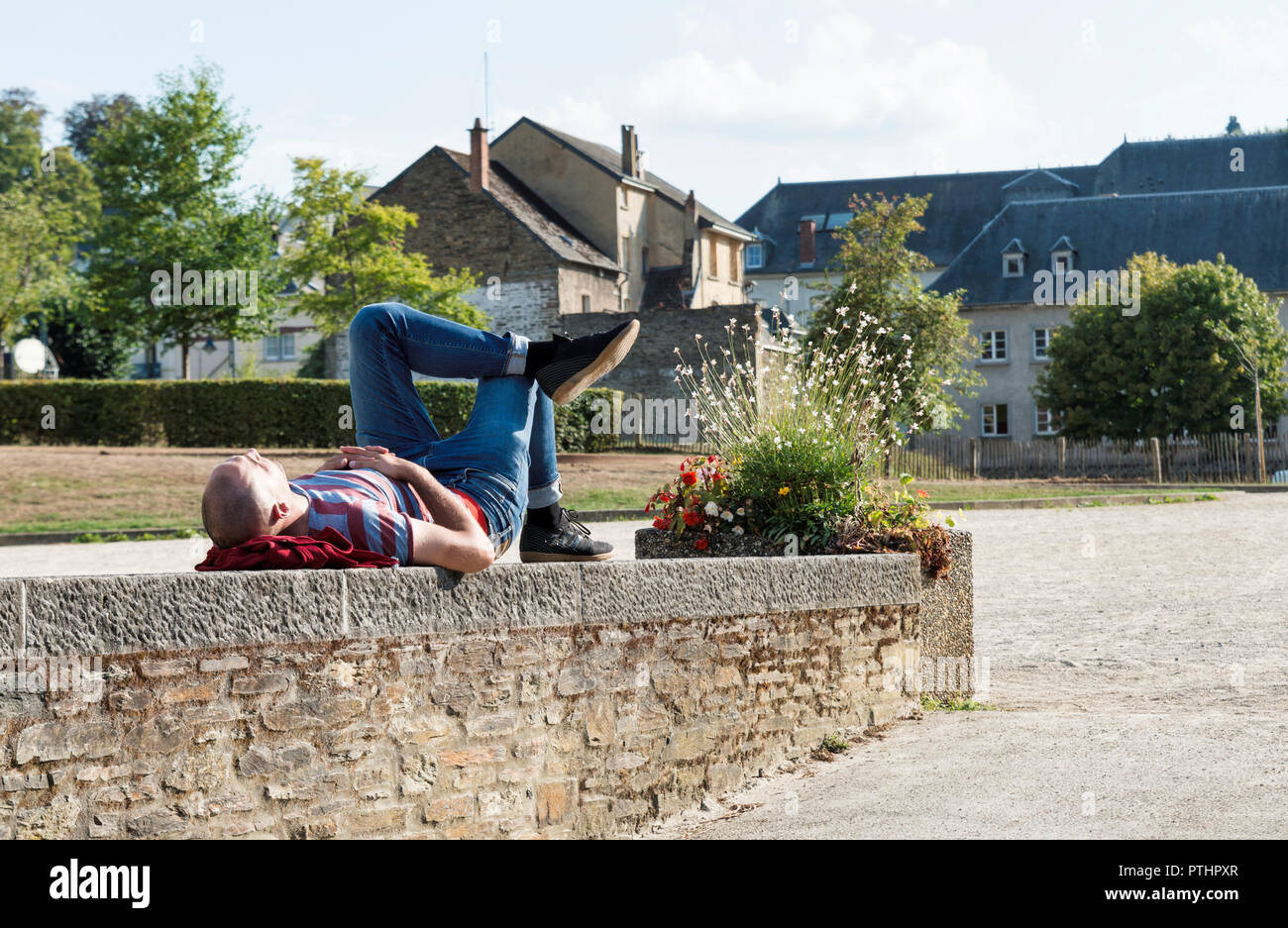 Man resting wall hi-res stock photography and images - Alamy