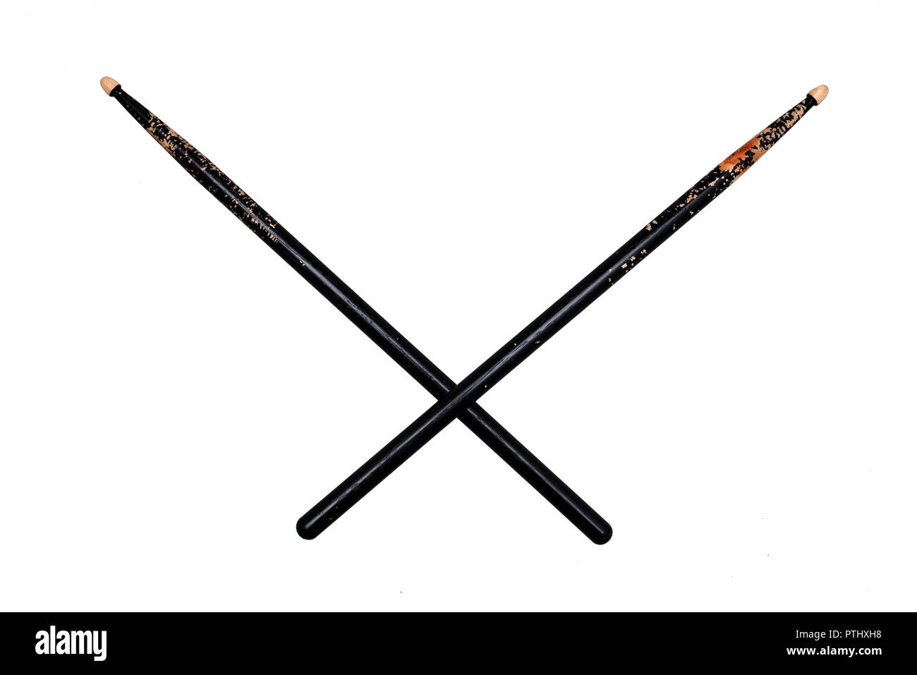 two crossed used black drumsticks on white background Stock Photo - Alamy