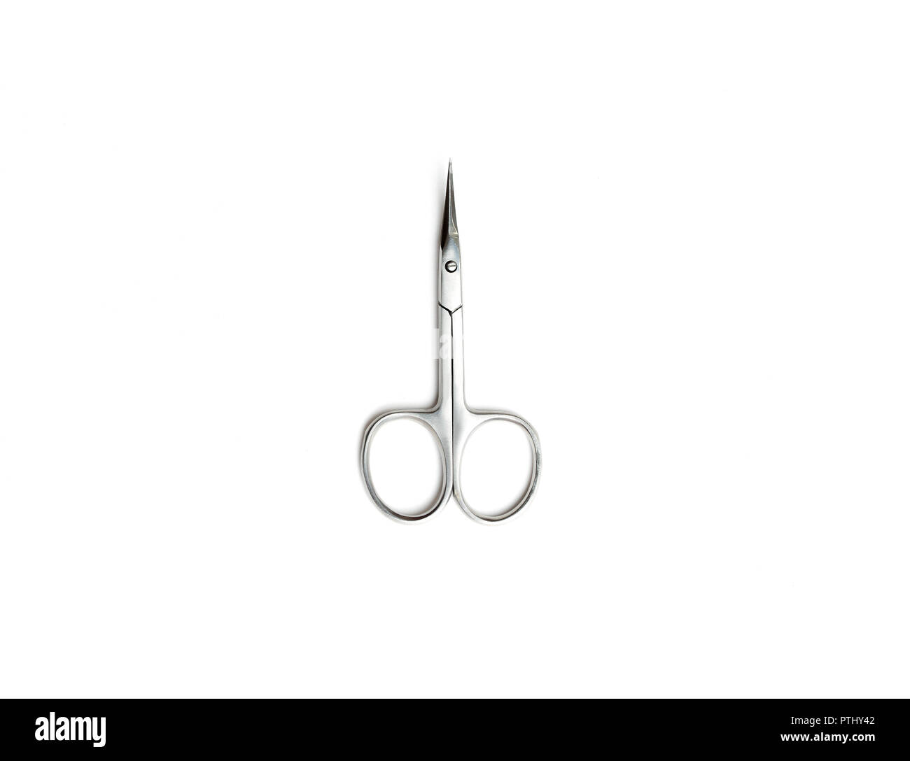 Small nail scissors are on a white background Stock Photo - Alamy