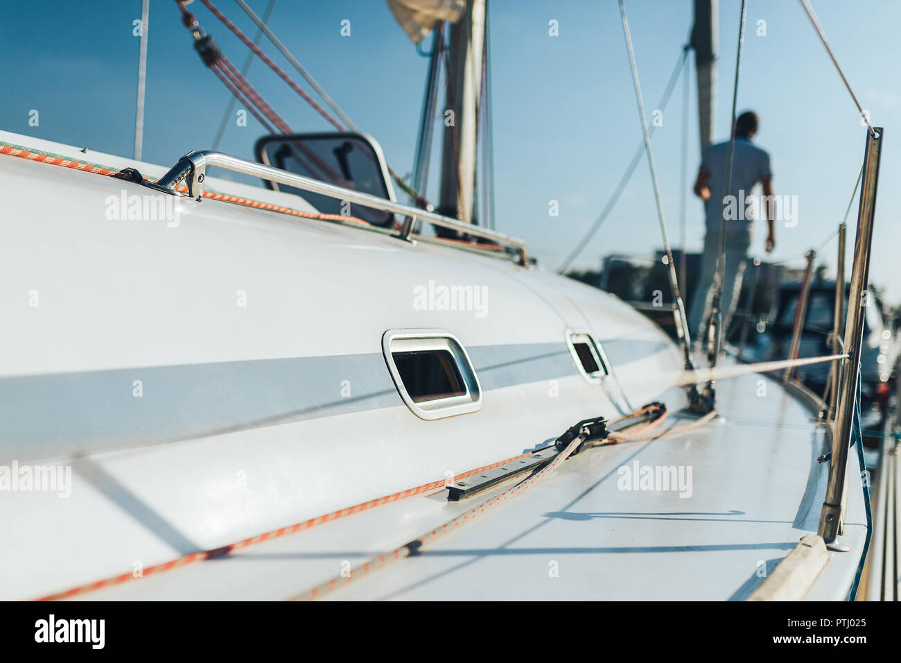 Man standing on sail boat hi-res stock photography and images - Alamy