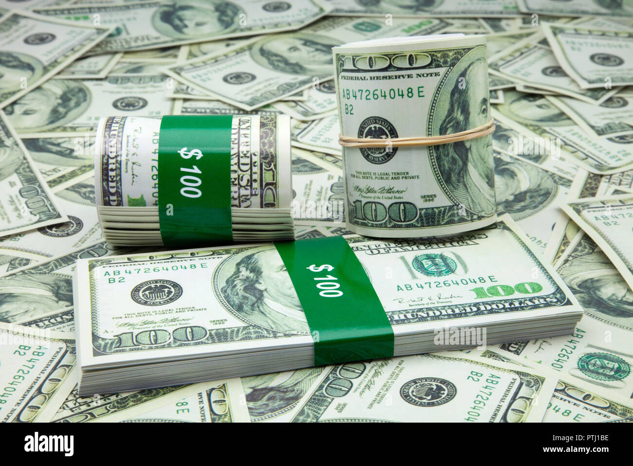 bundles of tickets for hundred dollars Stock Photo - Alamy