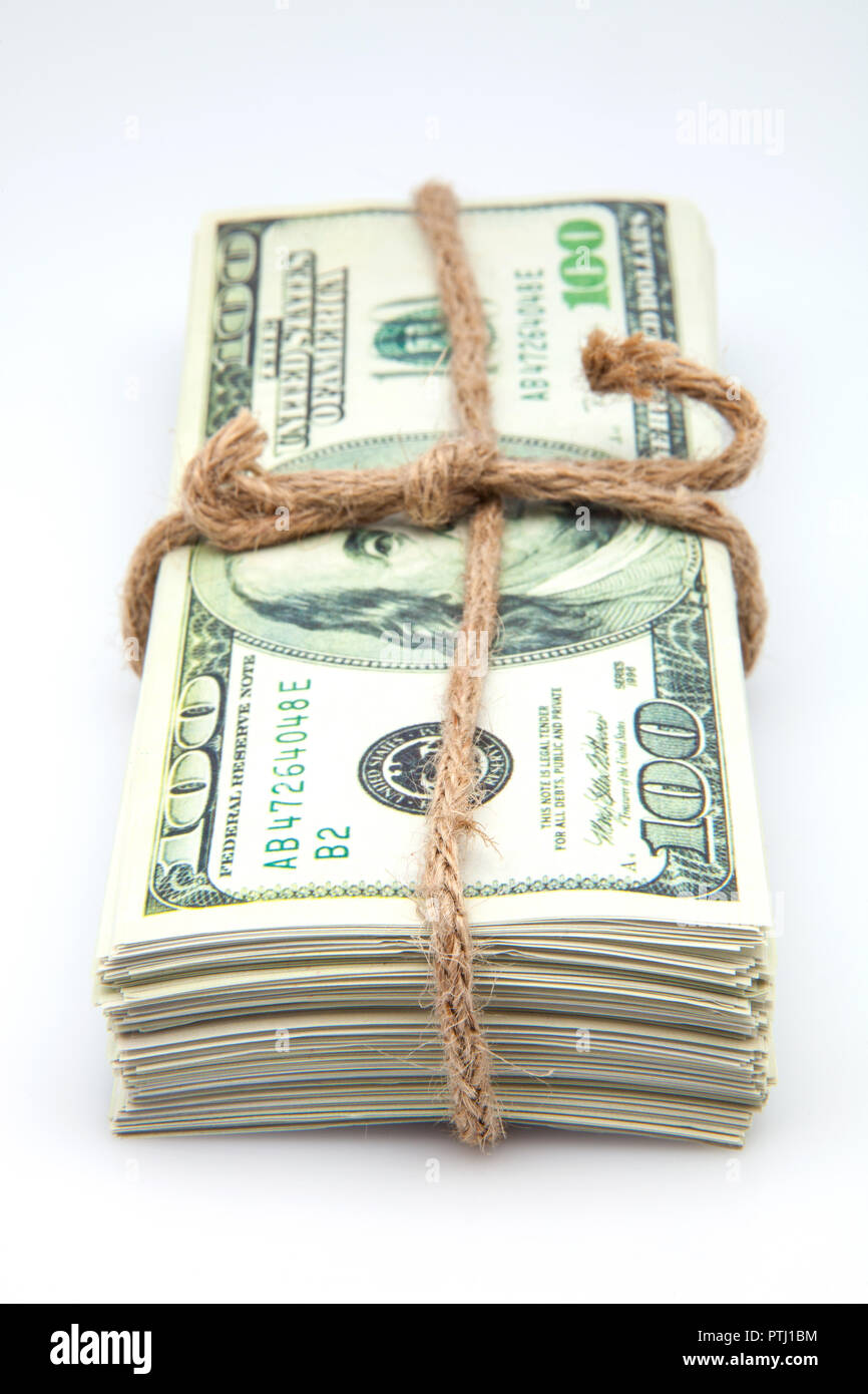 Bundle of us money tied with string hi-res stock photography and images ...