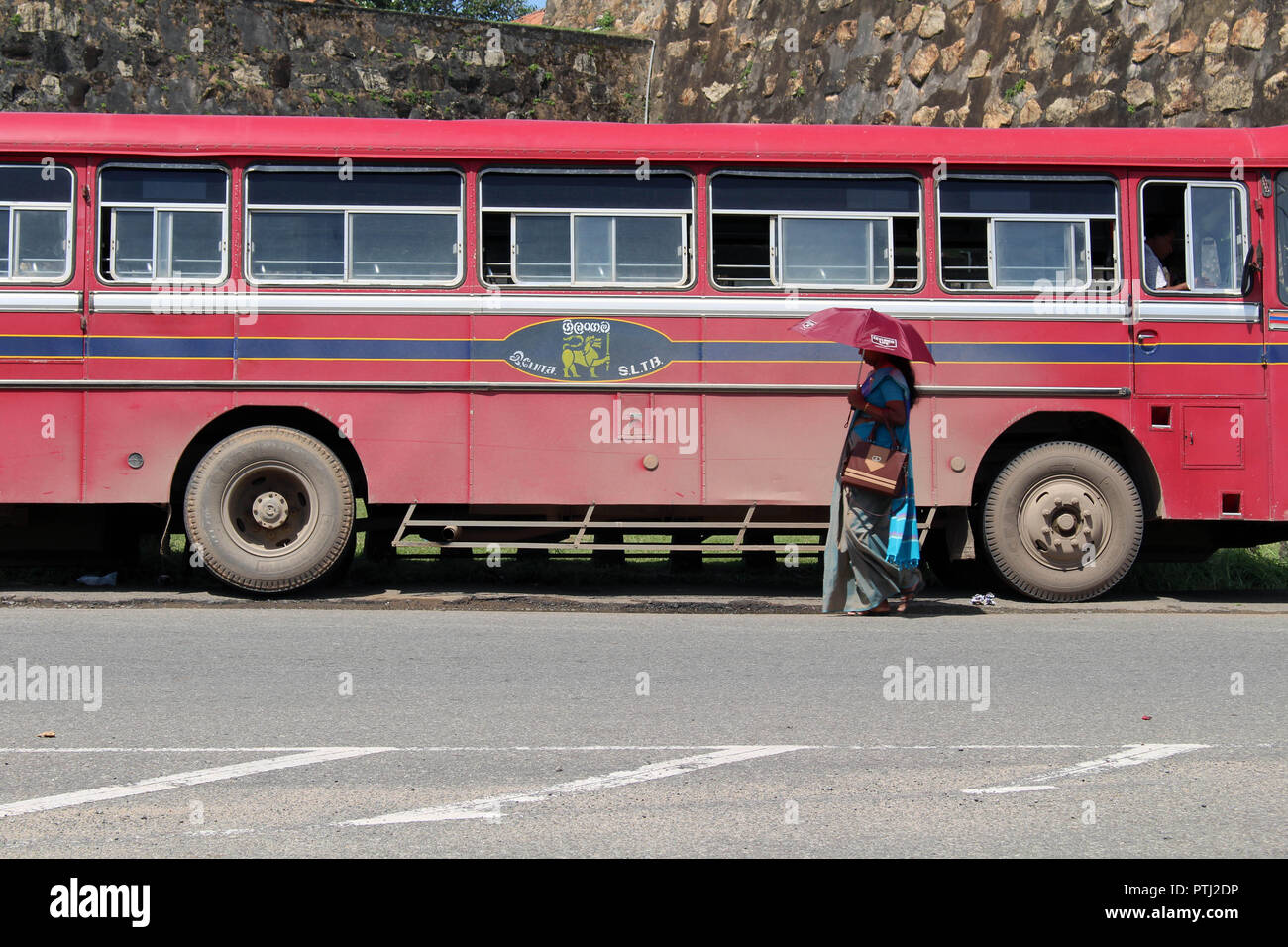 A red bus stopping around Galle Fort. Taken in Sri Lanka, August 2018 ...