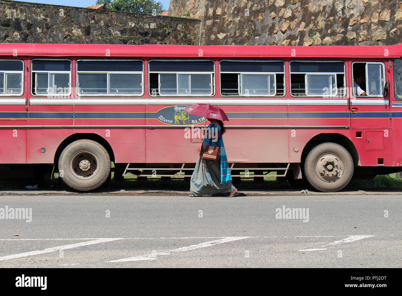 A red bus stopping around Galle Fort. Taken in Sri Lanka, August 2018 ...