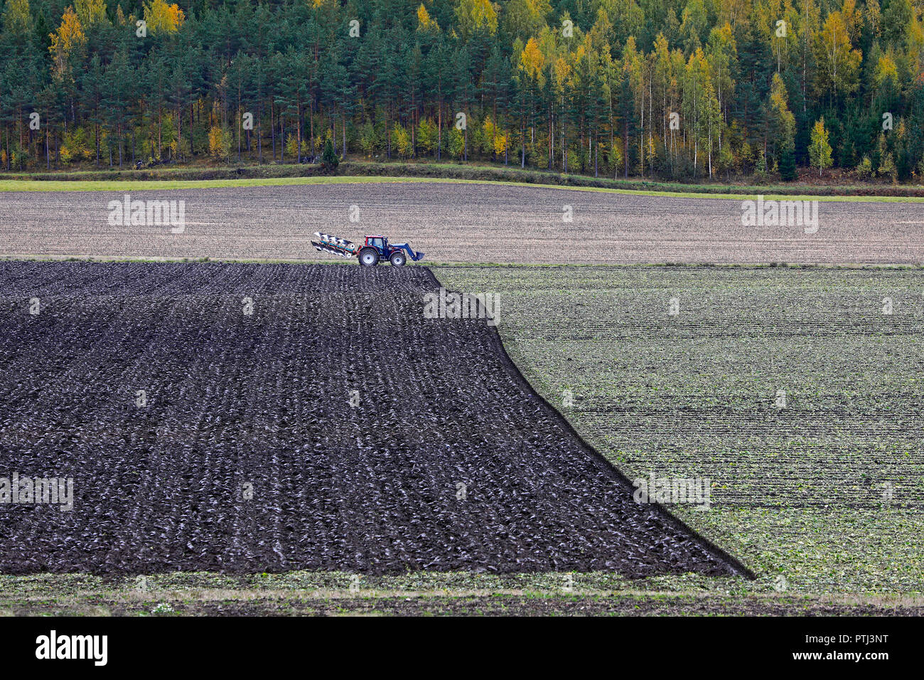 Side view of tractor with plough hi-res stock photography and images ...