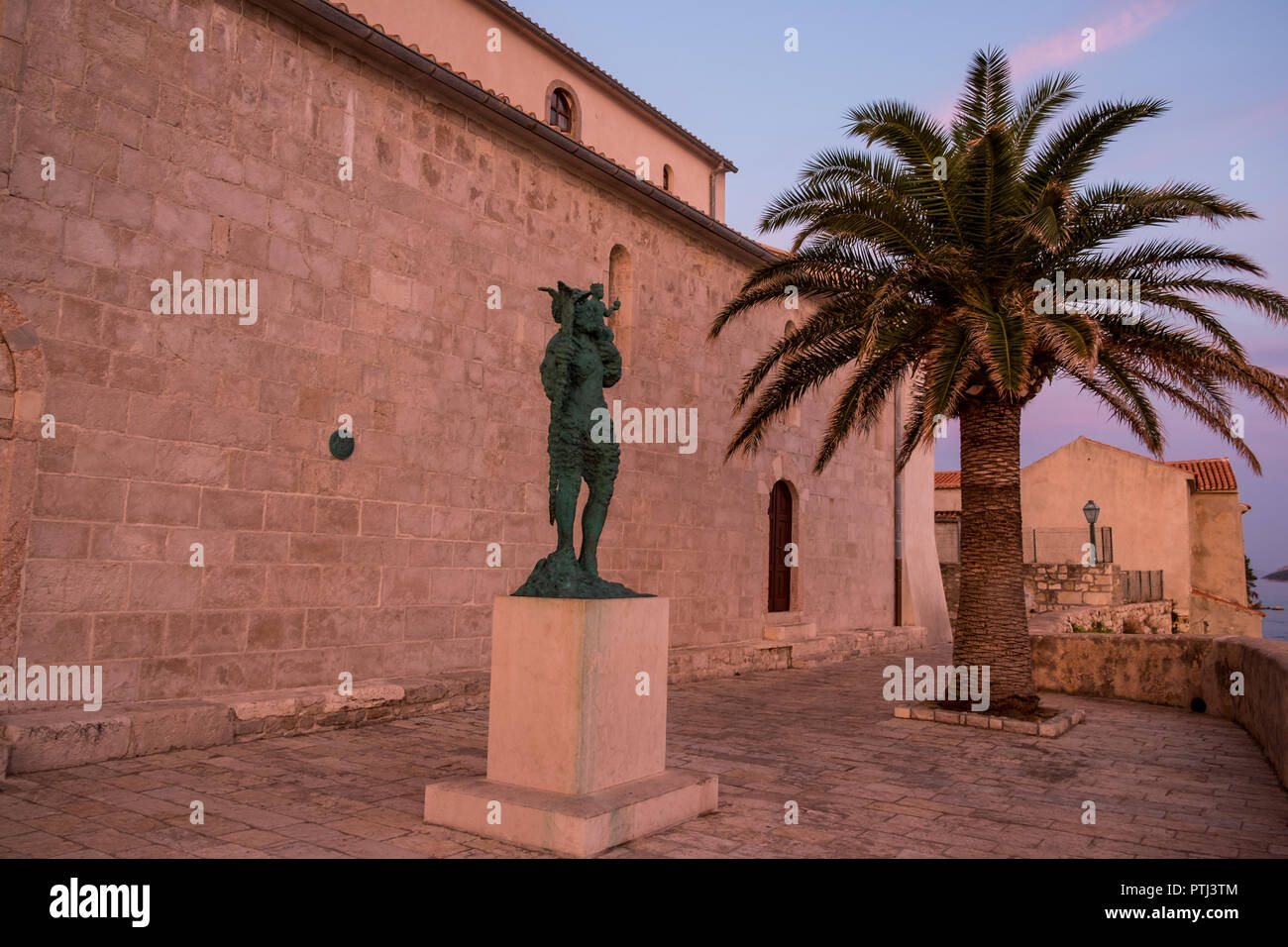 Rab Island, Croatia - 10 August 2018 - Statue of Saint Christopher next ...