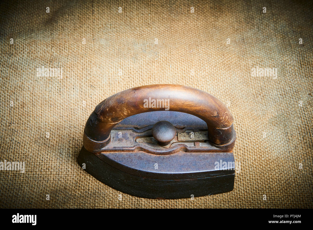 Close up of vintage old rusty iron on sack cloth. Selective focus Stock ...