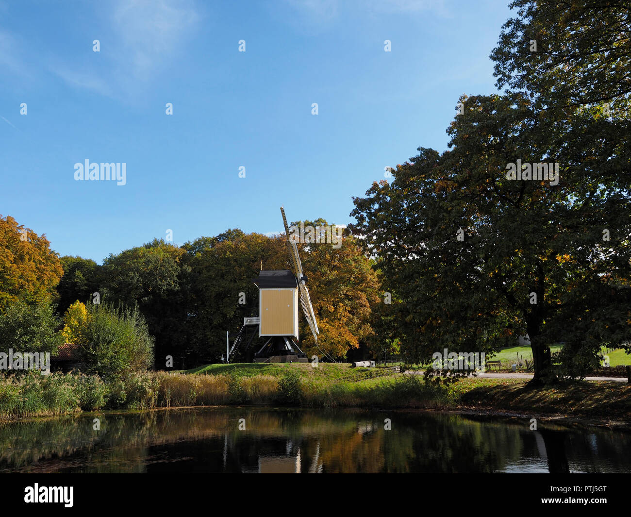 Old Dutch windmill of a specific type that is standing on a frame so ...