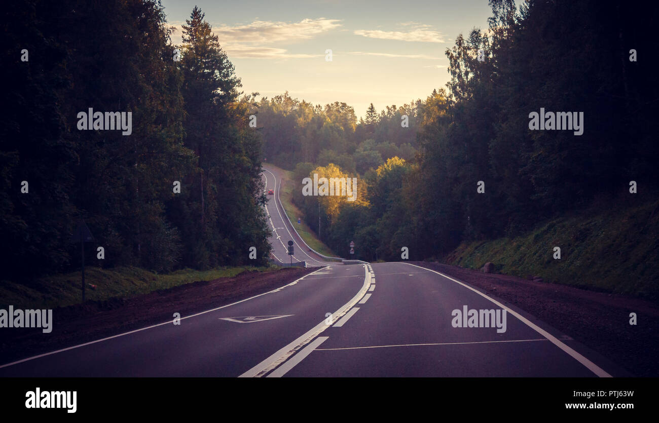 Russian roads in Karelia. Travel by road. Asphalt road. Smooth road car ...