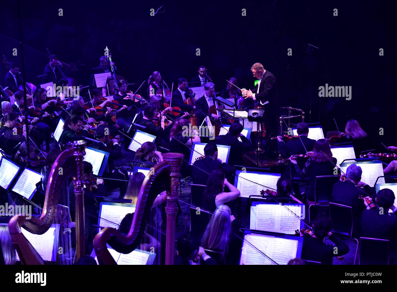 Patrick Hawes conducts the Royal Philharmonic Orchestra on stage at the ...