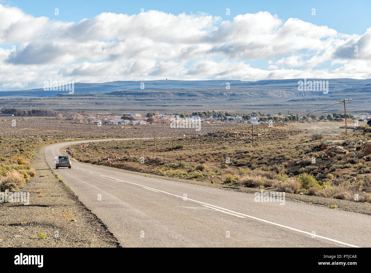 SUTHERLAND, SOUTH AFRICA, AUGUST 7, 2018: A vehicle on road R356 with ...