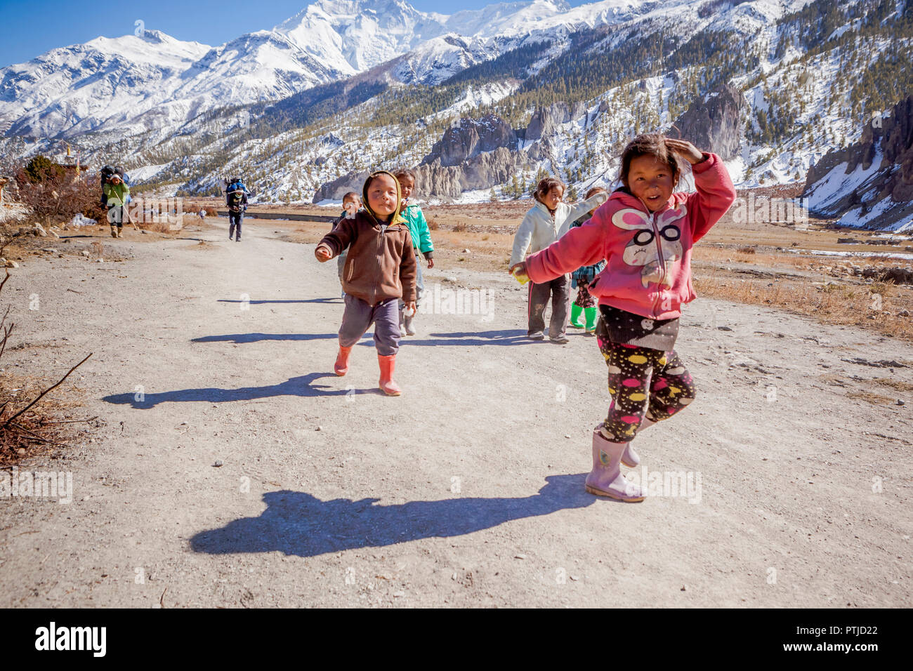 Children playing in the street hi-res stock photography and images - Alamy