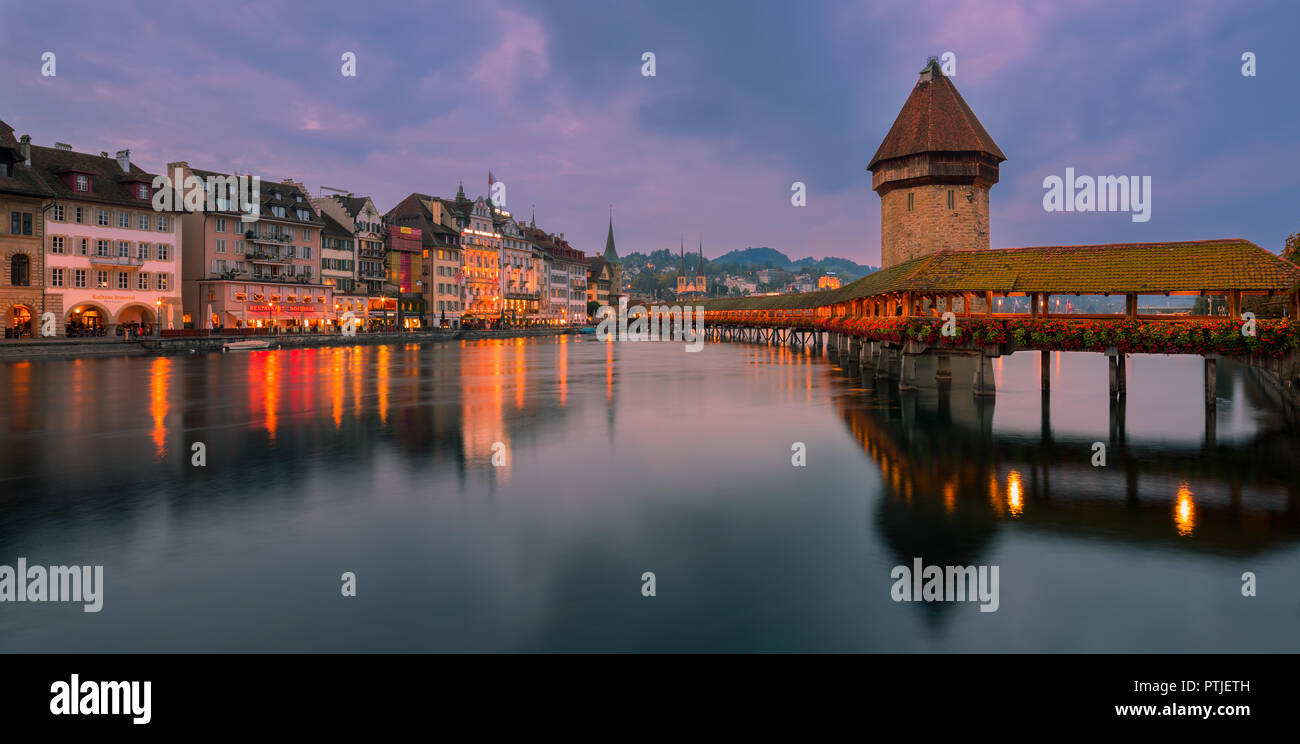 The Kapellbrücke (Chapel Bridge) is a covered wooden footbridge ...