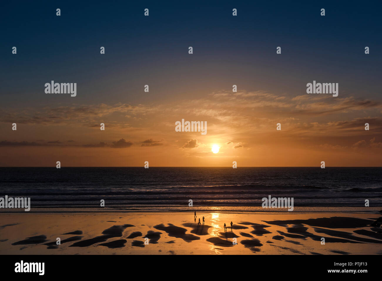 A spectacular sunset over Fistral Beach in Newquay in Cornwall Stock ...