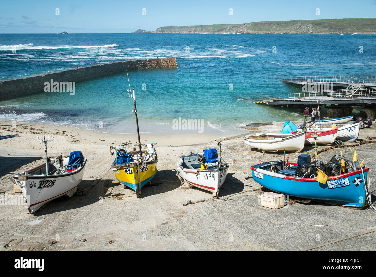 Small fishing boats on a slipway in Sennen Cove in Cornwall Stock Photo ...